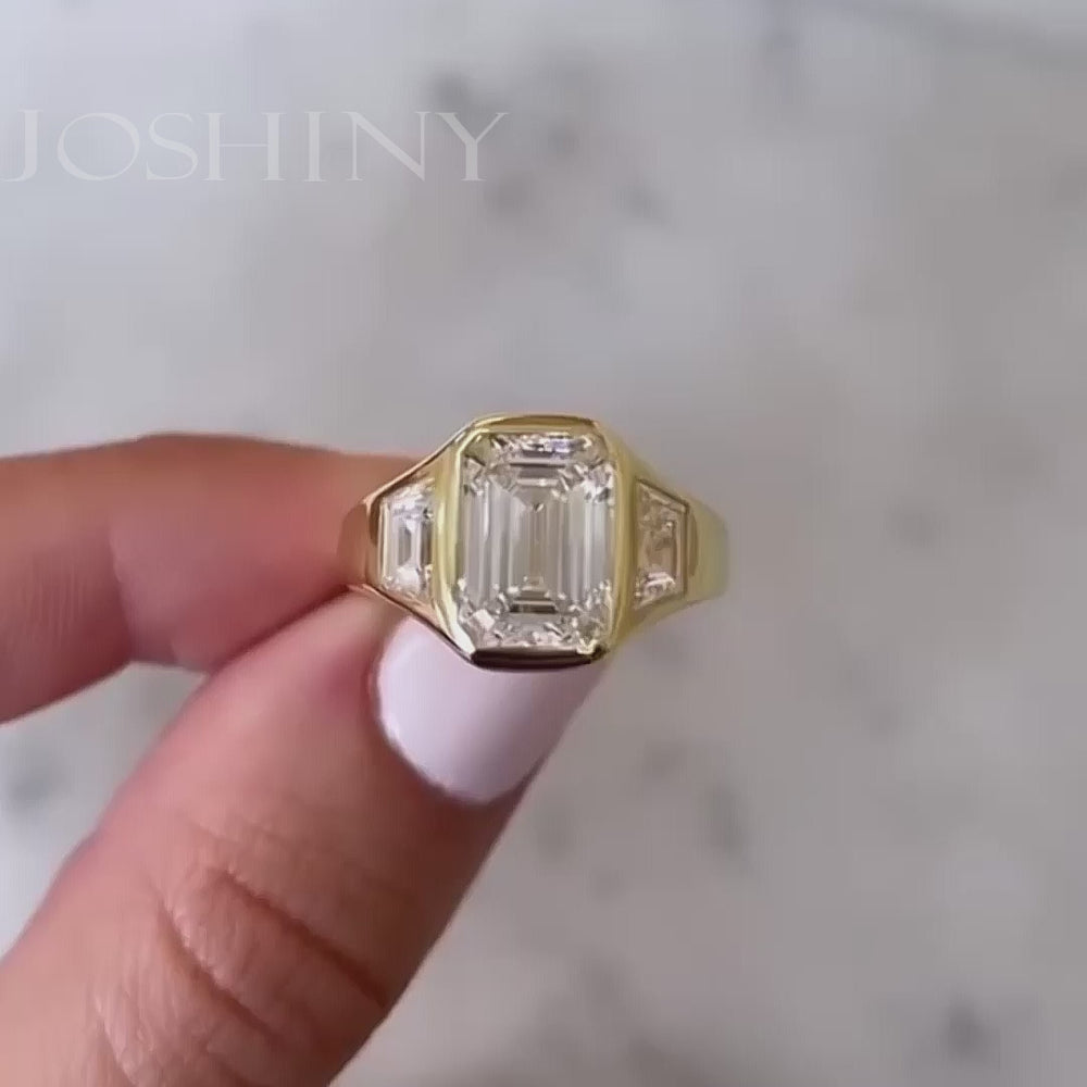 4.5ct three stone emerald cut all over bezel set yellow gold engagemen